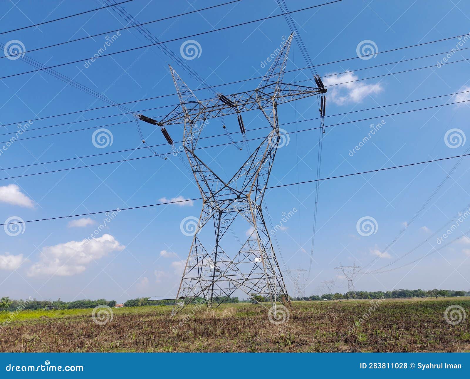 High Voltage Power Tower with Blue Sky Background Stock Photo - Image ...