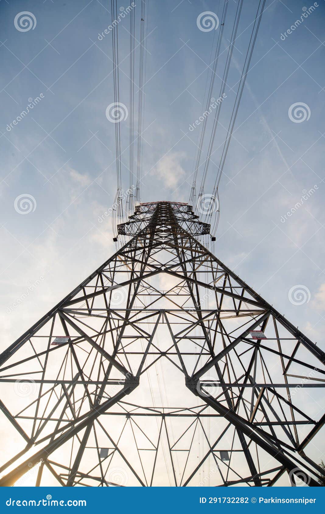 High-Voltage Power Tower from Ground Perspective Stock Photo - Image of ...