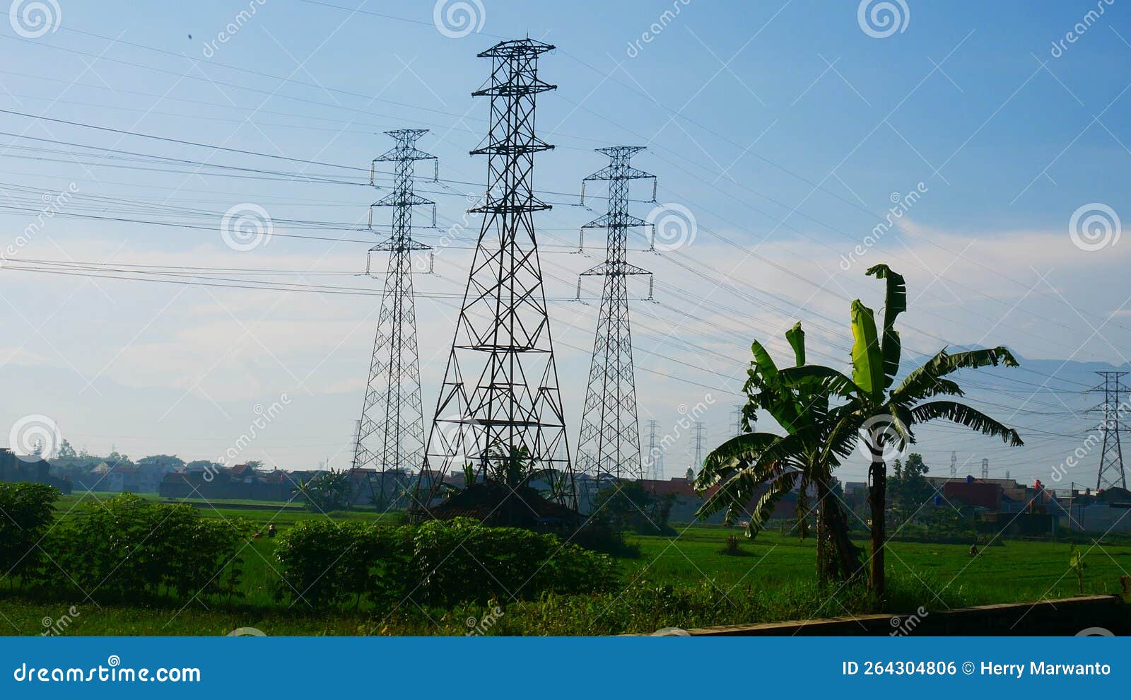 A HIGH-VOLTAGE POWER TOWER stock photo. Image of mill - 264304806