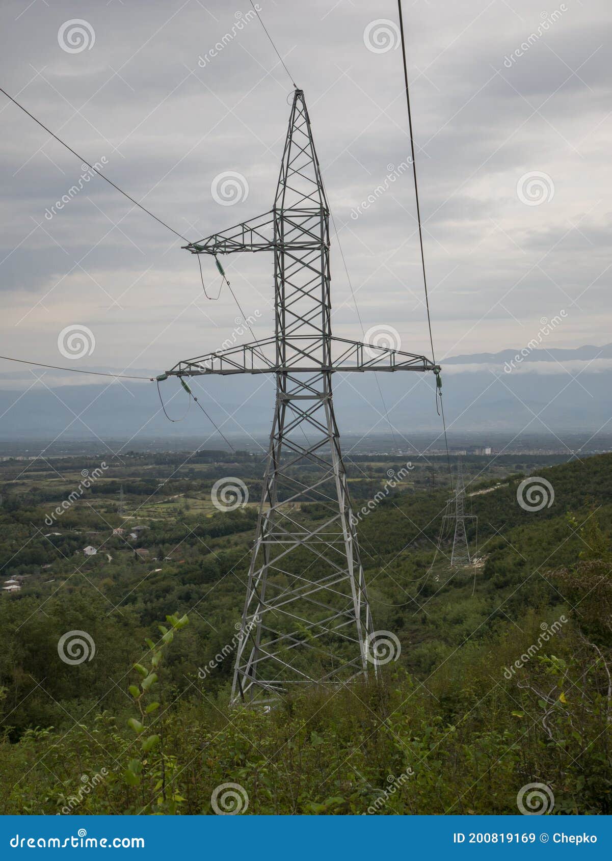 High-voltage Power Transmission Towers Over Farm Fields Stock Image ...