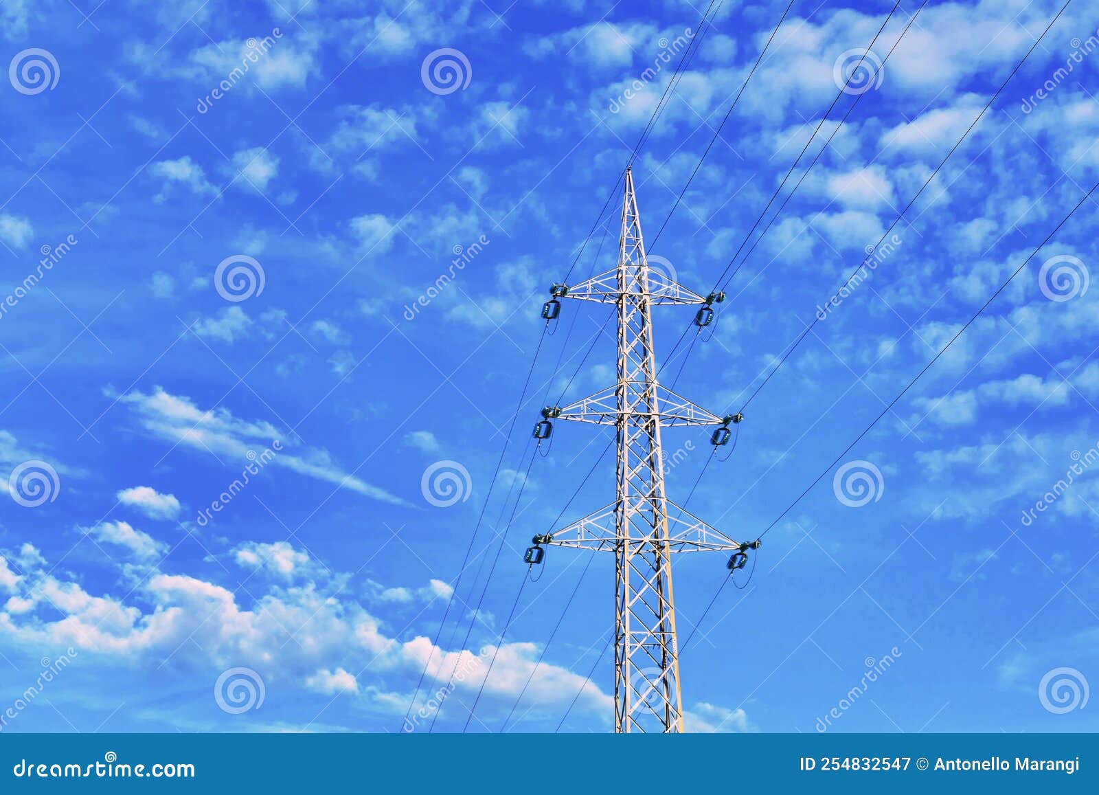 High Voltage Pylon View from Below Under Blue Cloudy Sky Stock Image ...