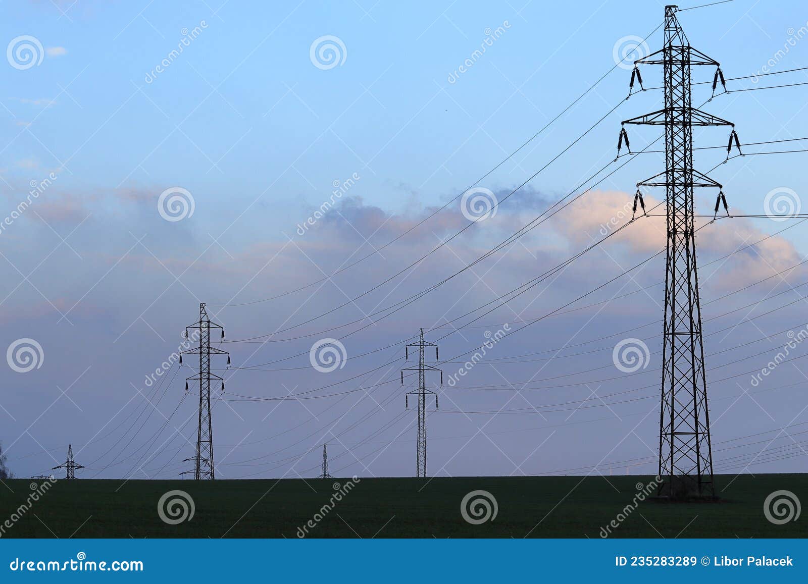 High Voltage Pylons. High Voltage Power Lines. Electrical Distribution ...