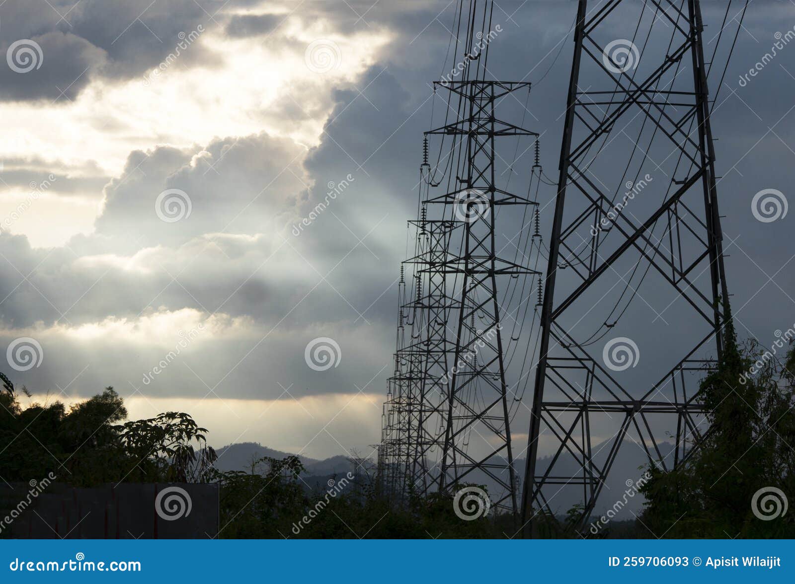 High Voltage Tower with Sunlight Ray in the Evening. Stock Image ...