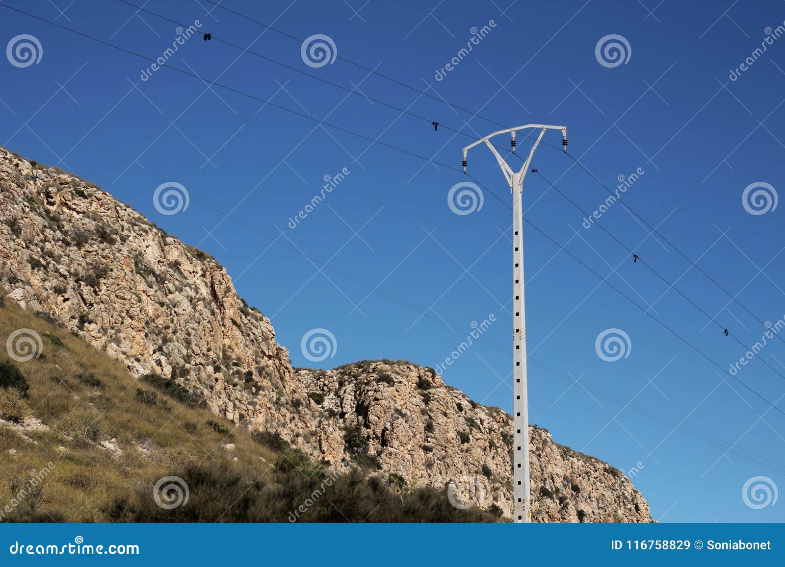 High Voltage Towers in the Mountain Editorial Stock Image - Image of ...