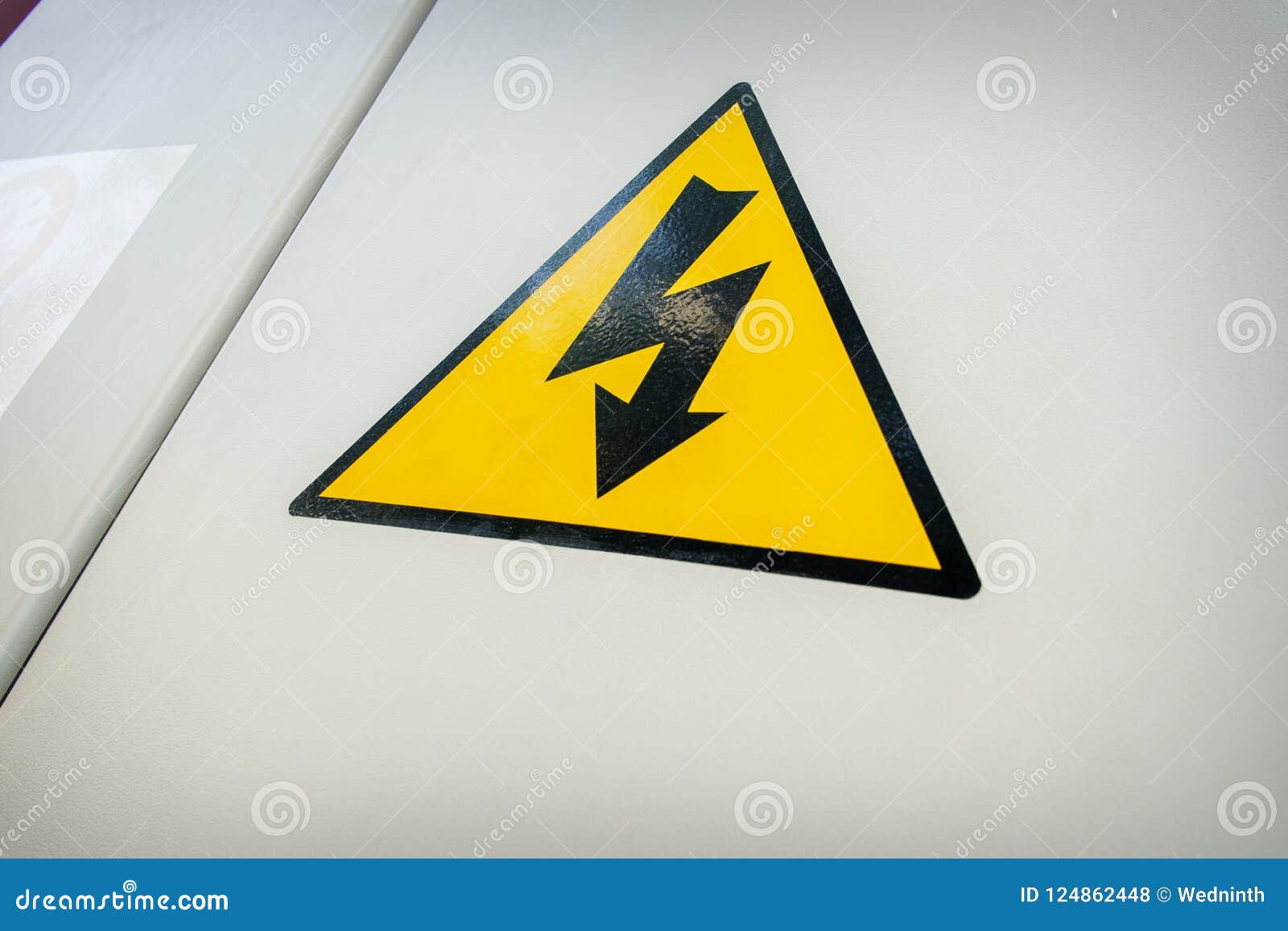 High Voltage Triangle Warning Sign Mounted Stock Photo - Image of ...