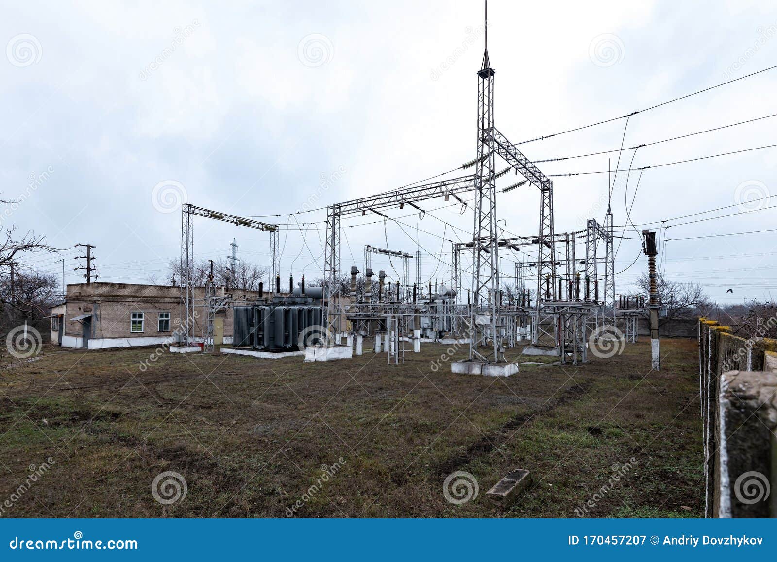 High Voltage Urban Electrical Substation with High Voltage Wires and ...