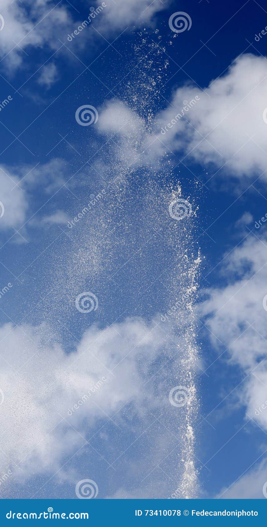 High Water Jet in the Background of the Blue Sky with White Clou Stock ...