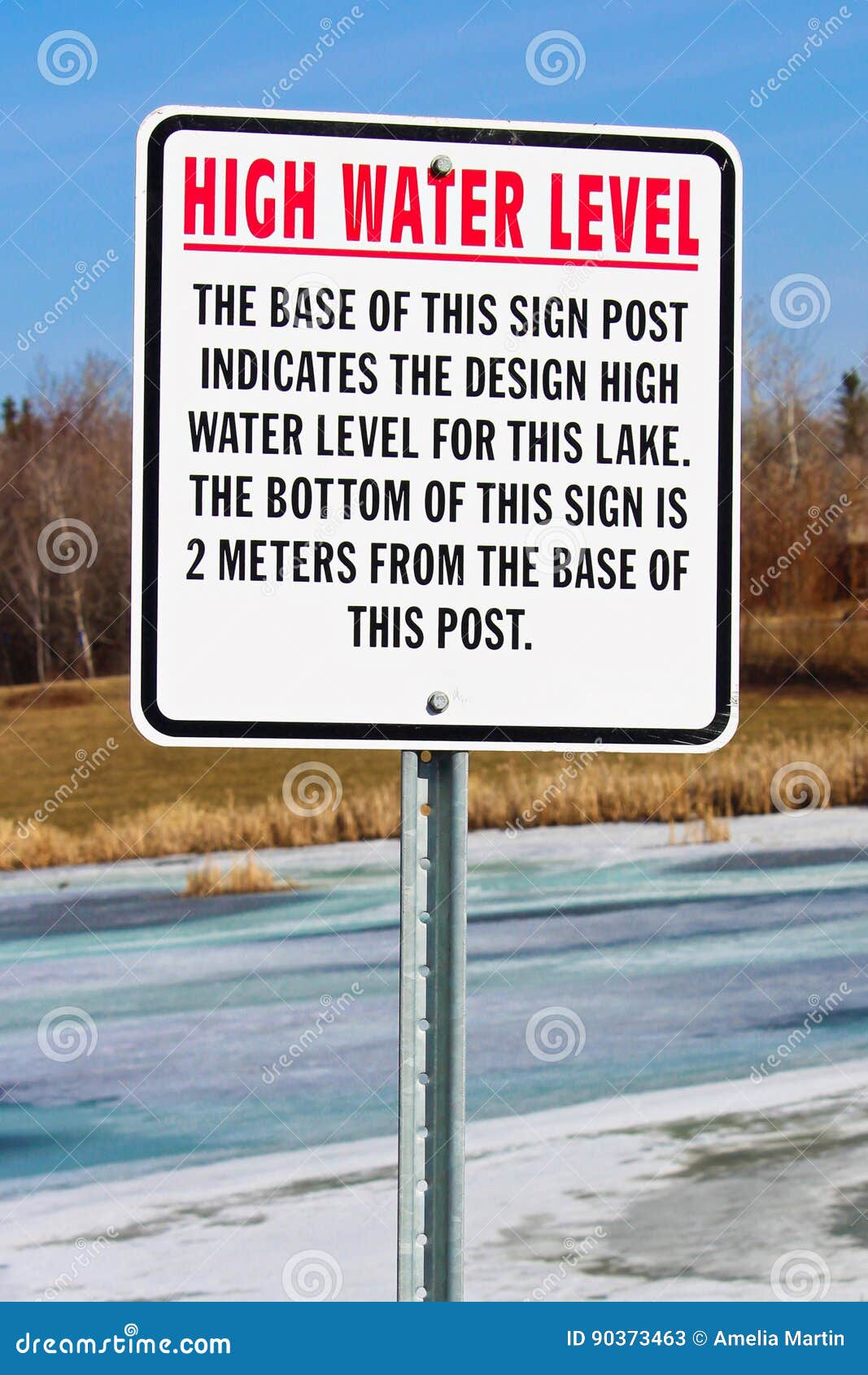 High Water Level Sign Along a Storm Drainage Pond Stock Image - Image ...