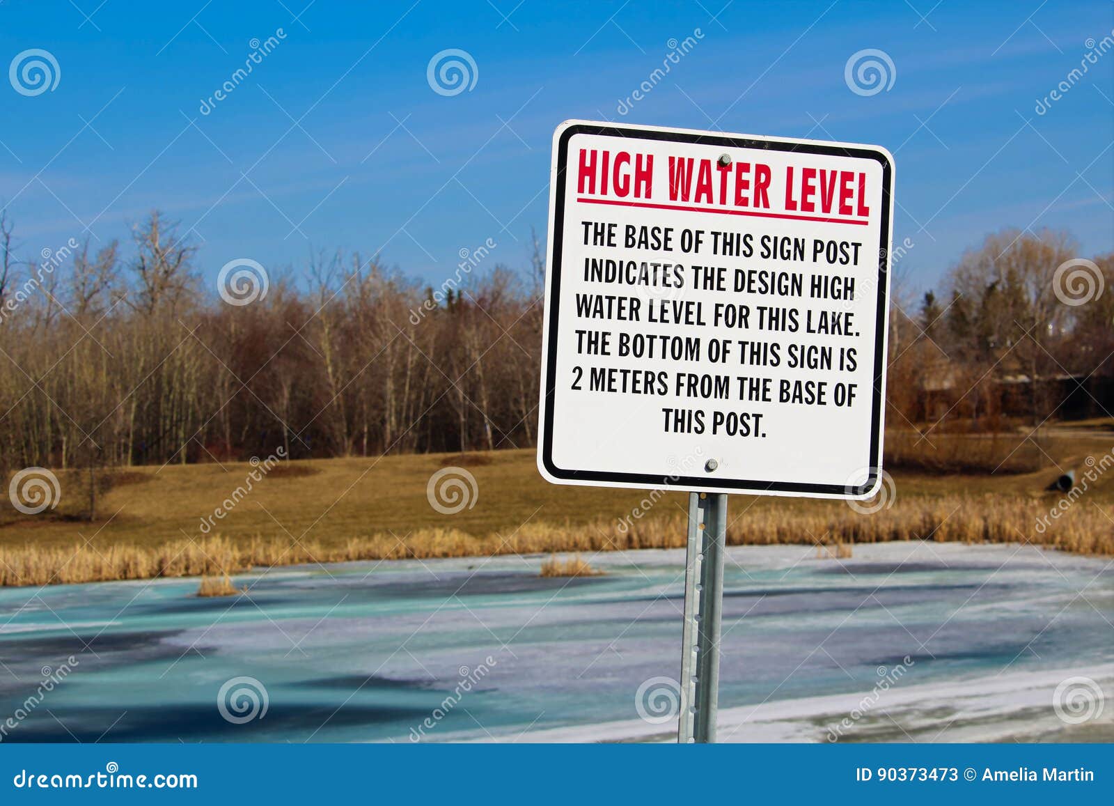 High Water Level Sign Along a Storm Drainage Pond Stock Image - Image ...