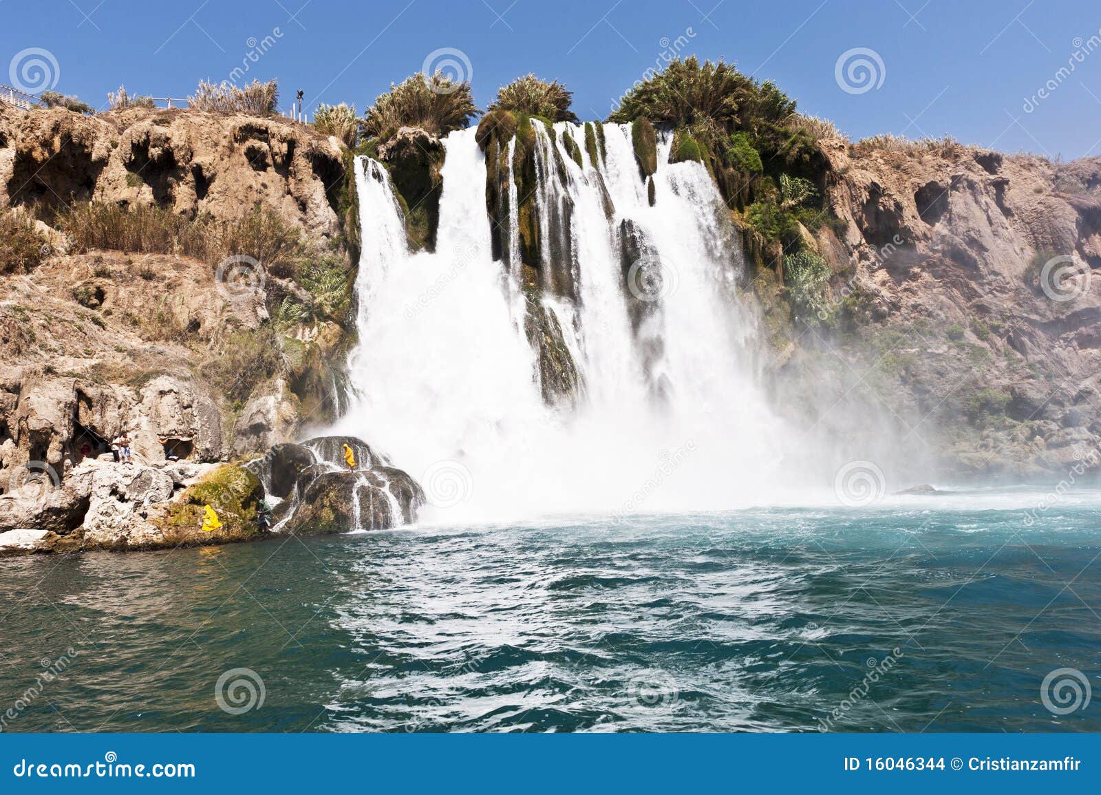 High Waterfall Flowing into the Sea Stock Photo - Image of beach, lake ...