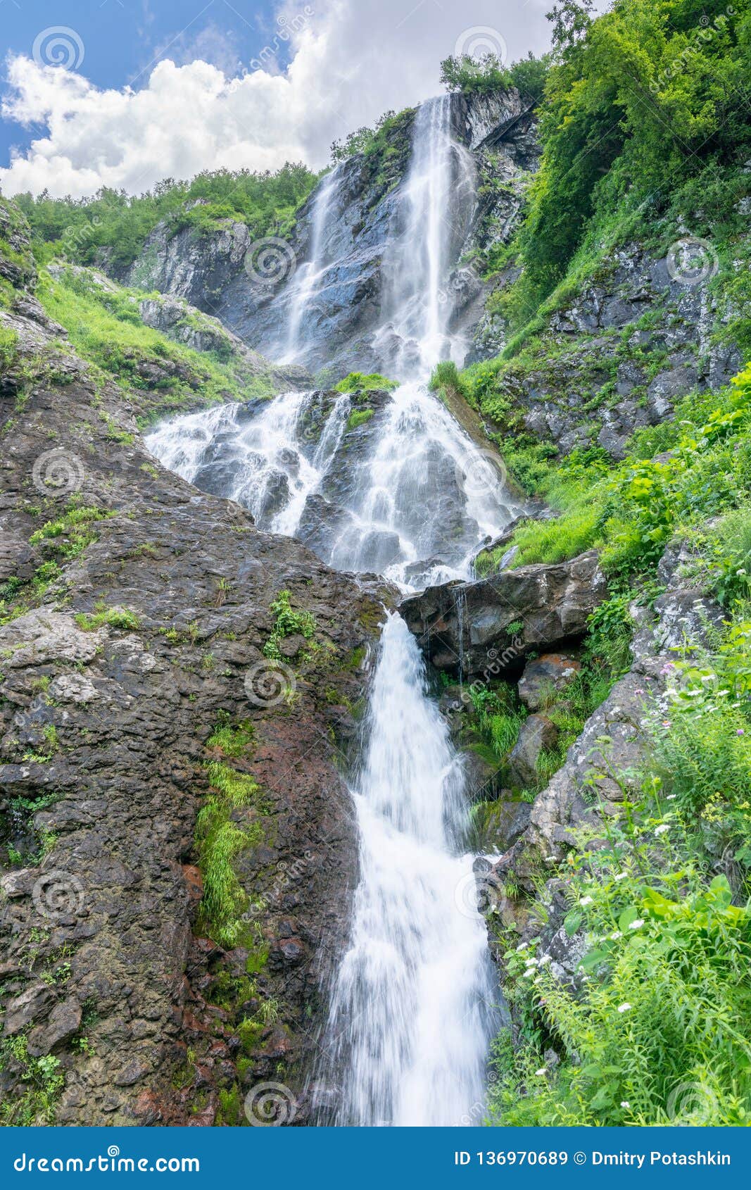 High Waterfall with a Powerful Stream Falling from a Cliff Stock Image ...