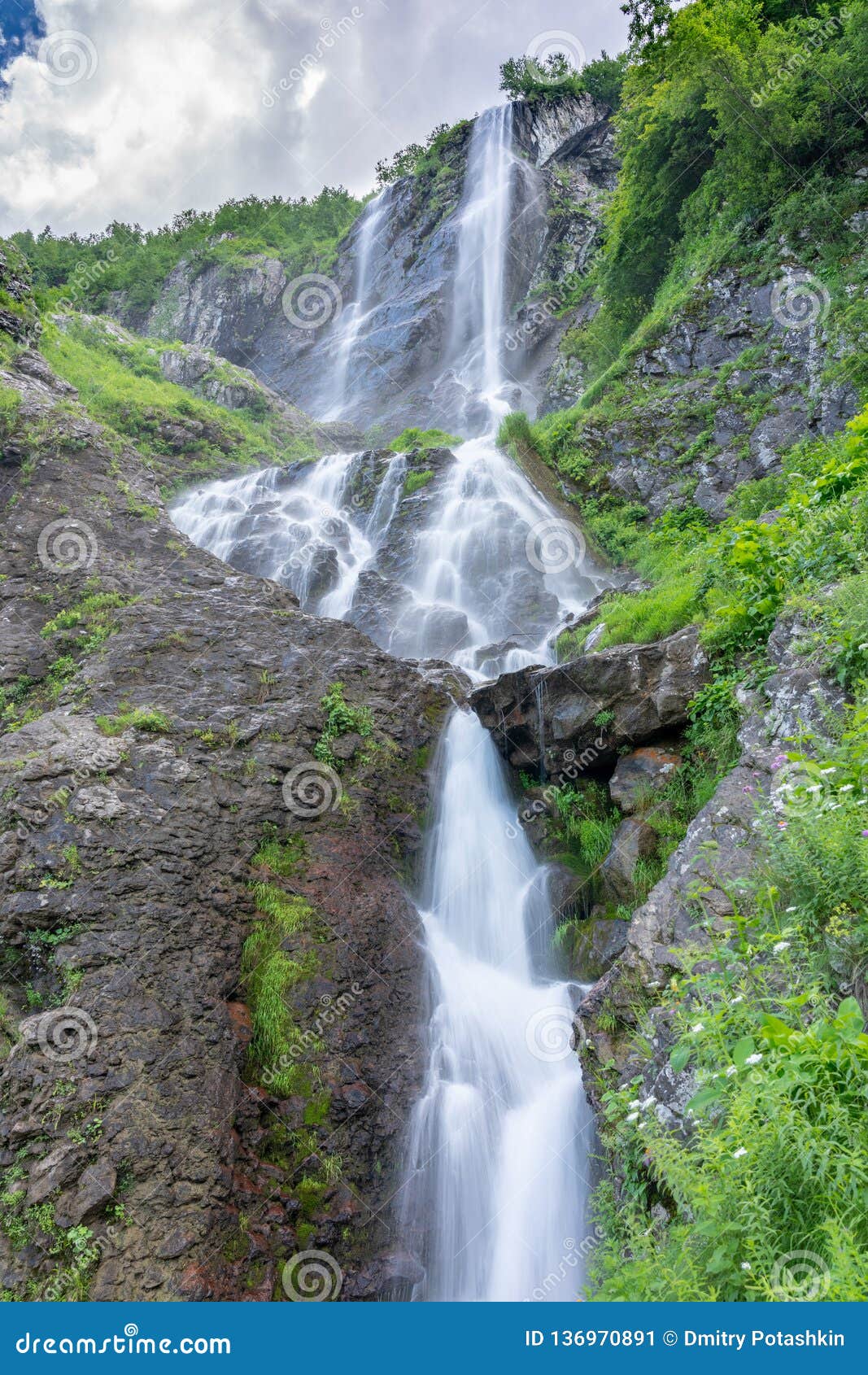 High Waterfall with a Powerful Stream Falling from a Cliff Stock Image ...