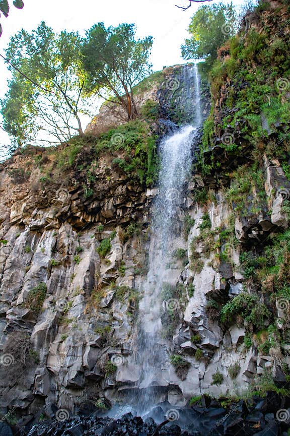 High Waterfall and Rocks. the Waterfall Comes from a High Rock Stock ...