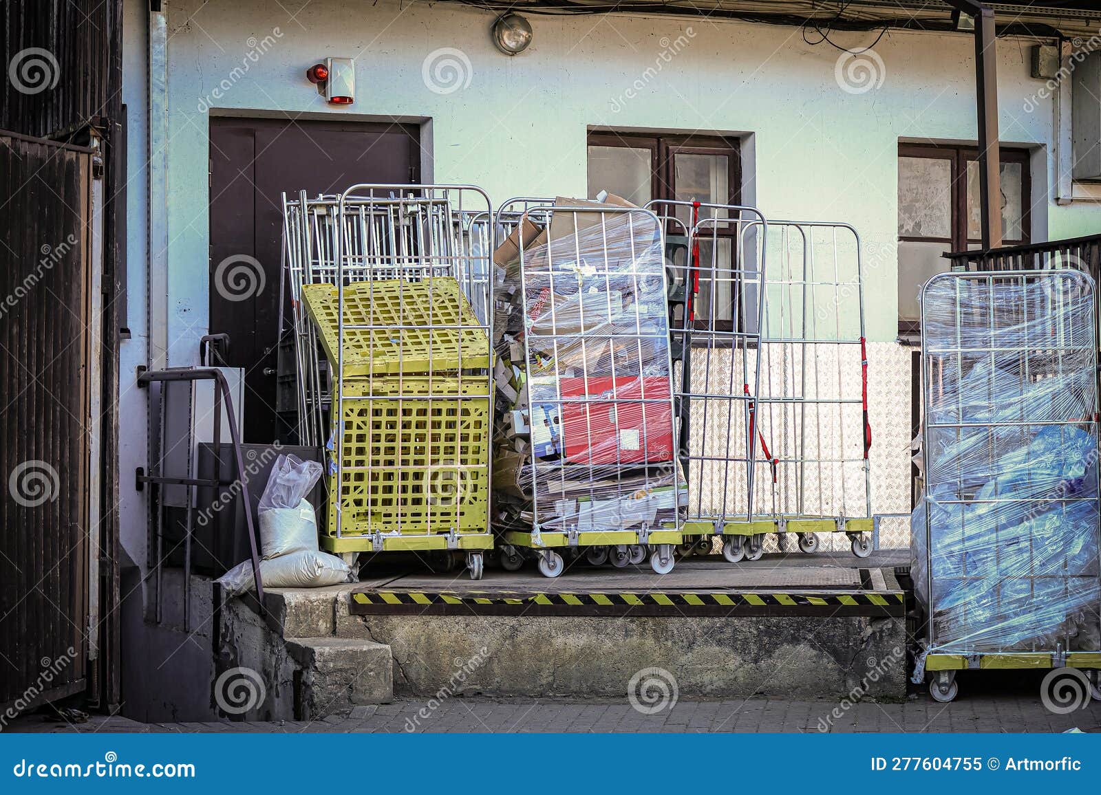 High Wire Trash Containers with Carton Boxes Wrapped in Plastic Wrap ...