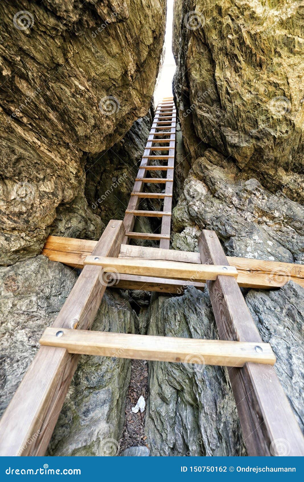 High Wooden Ladders between Stones Stock Photo - Image of exterior ...