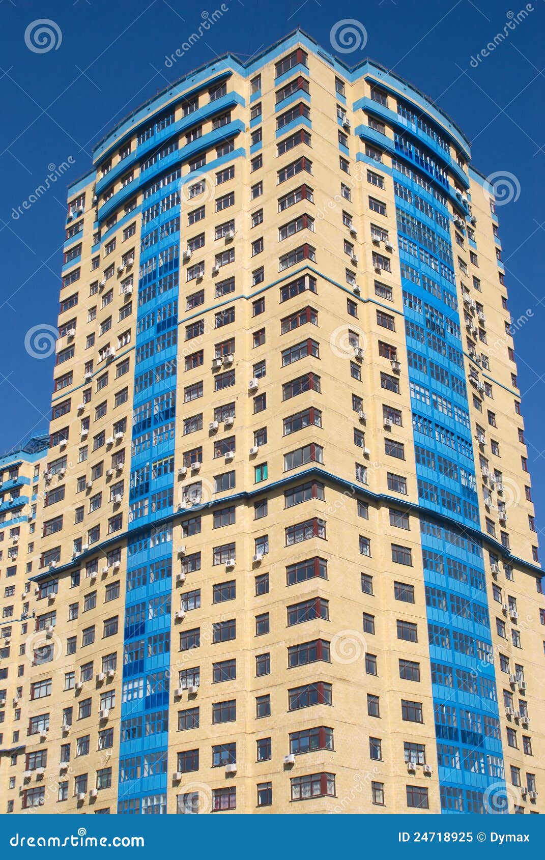 High Yellow Building on Blue Cloudless Sky Stock Image - Image of ...