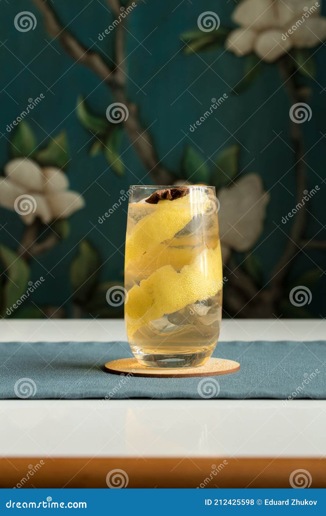 Highball Cocktail with Lemon Peel, Anise and Ice on the Table at ...