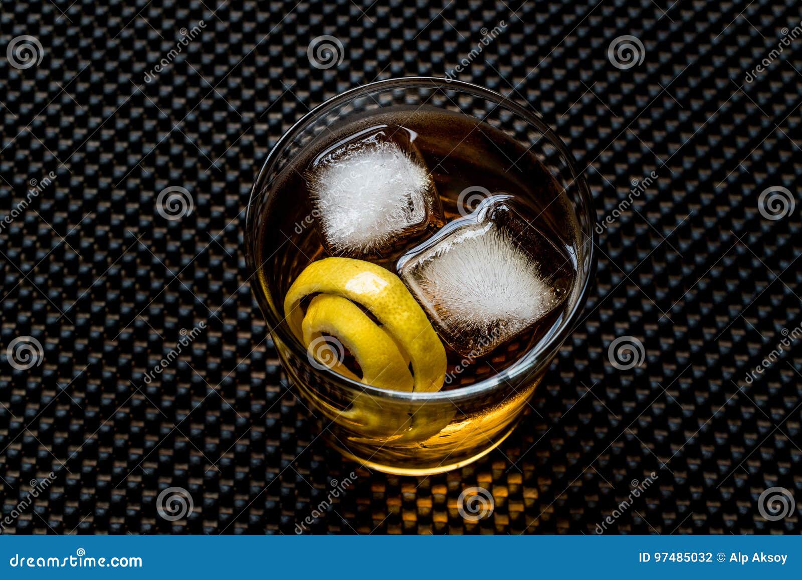 Highball Cocktail with Lemon Peel and Ice. Stock Photo - Image of ...