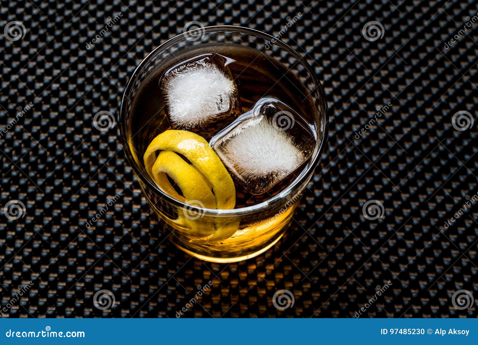 Highball Cocktail with Lemon Peel and Ice. Stock Photo - Image of ...