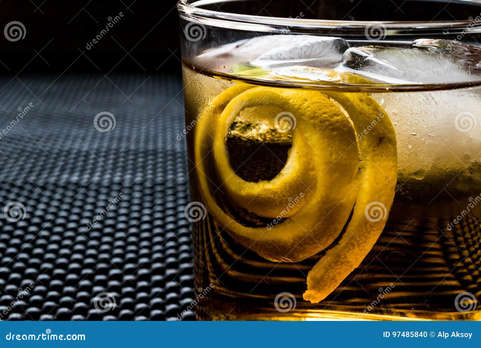 Highball Cocktail with Lemon Peel and Ice. Stock Photo - Image of ...