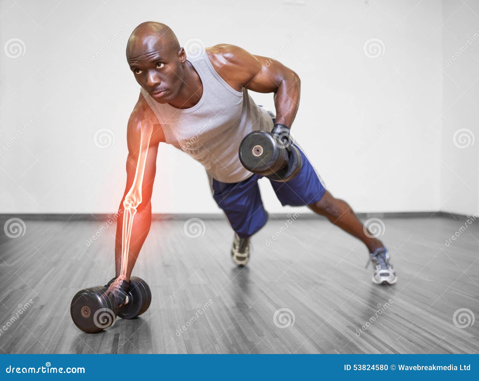Highlighted Arm of Strong Man Lifting Weights Stock Photo - Image of ...