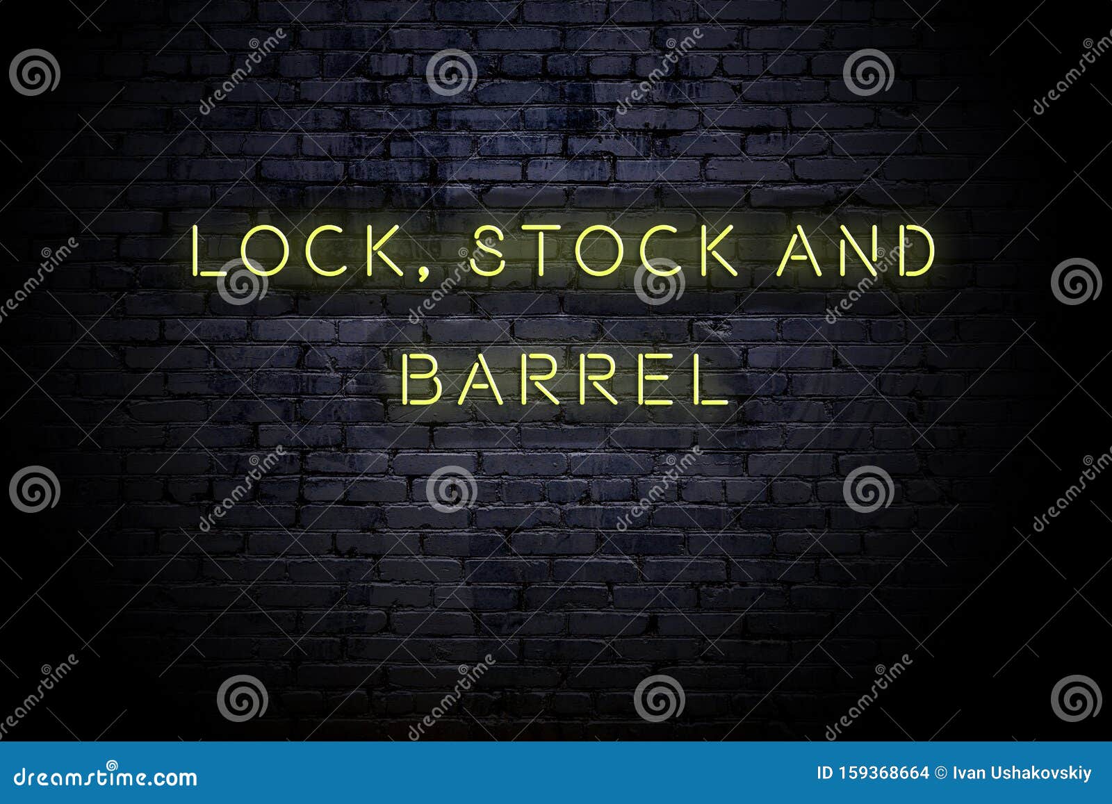 Highlighted Brick Wall with Neon Inscription Lock Stock and Barrel ...