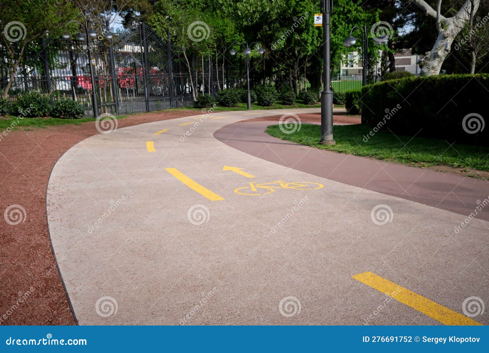 Highlighted with Yellow Paint Cycle Path in the City Park Stock Photo ...