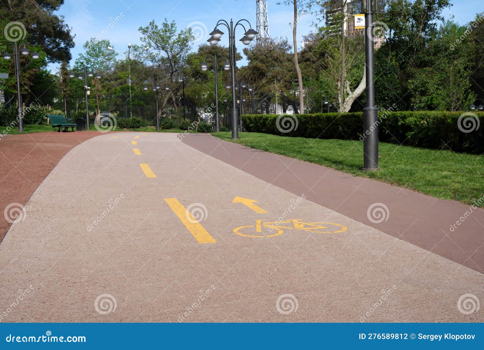 Highlighted with Yellow Paint Cycle Path in the City Park Stock Photo ...