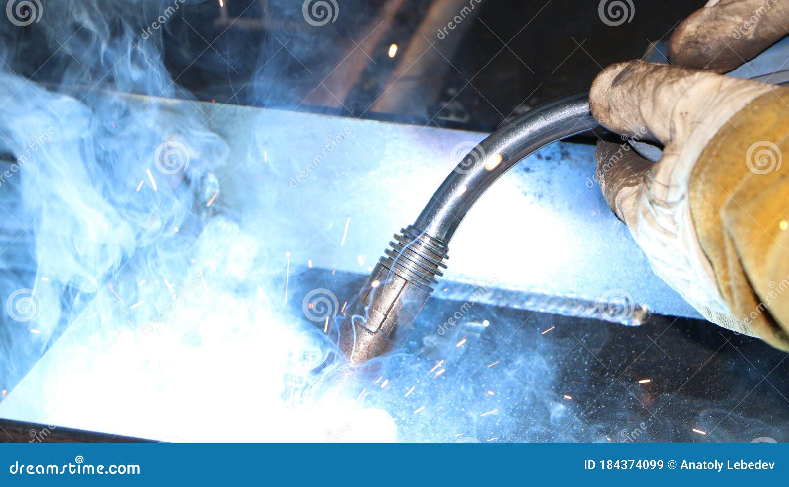 A Highly Skilled Welder Welds a Metal Structure at an Assembly Plant ...