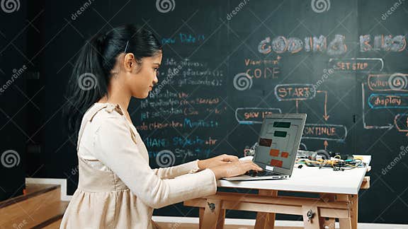 Girl Writing Code or Engineering Prompt while Attend in STEM Class. Edification. Stock Photo ...