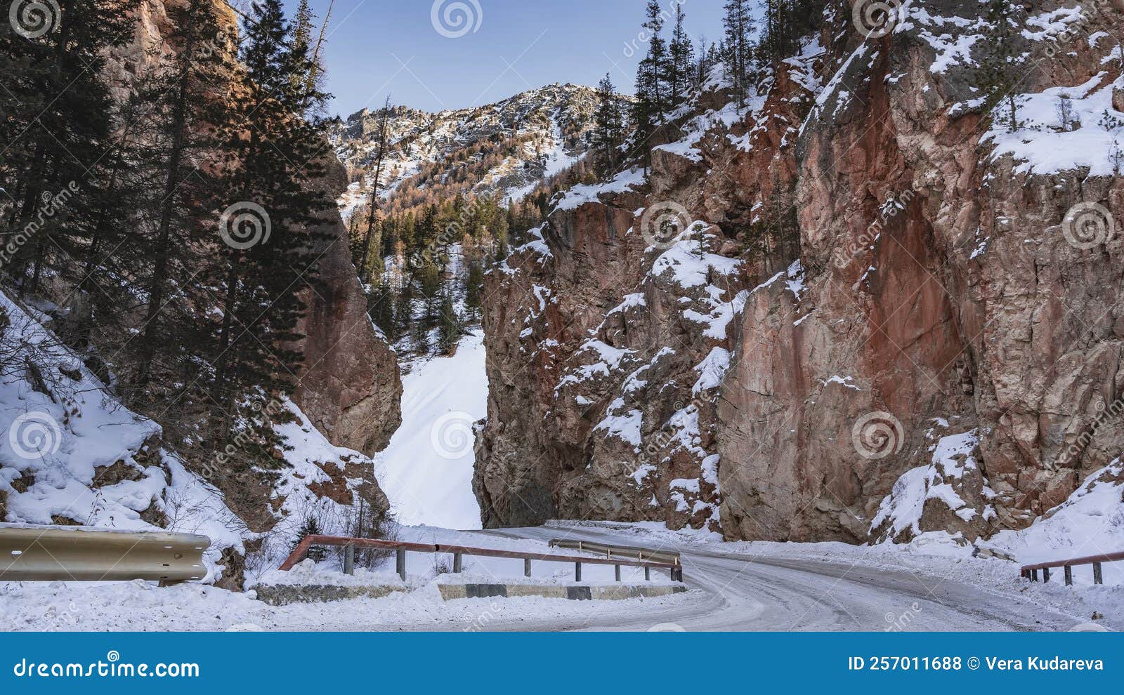 The Highway Bends and Passes between Steep Cliffs. Stock Photo - Image ...