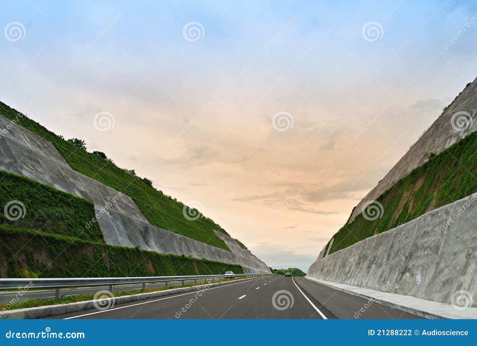 Highway Cut into Hills stock photo. Image of gray, automobile - 21288222