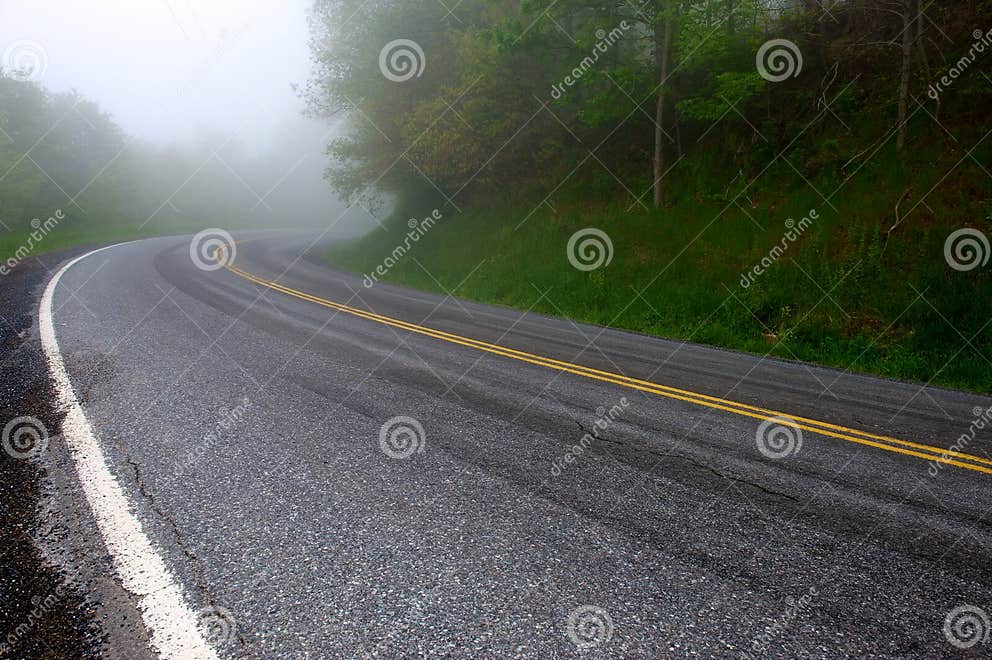 Highway Disappearing Around Curve Stock Photo - Image of highway ...