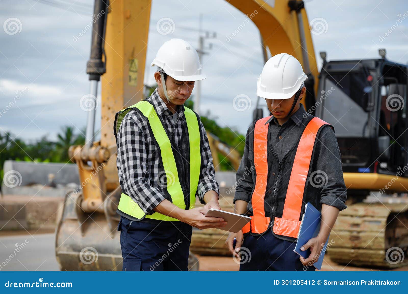 Highway Engineer Consultant and Young Engineer Planning Work Together ...