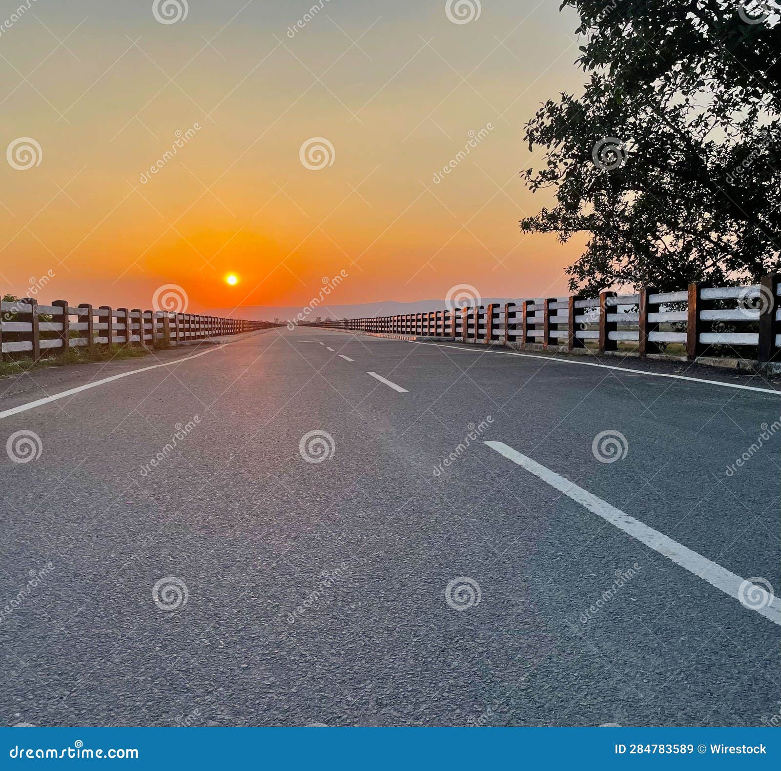 Highway in the Evening with Sun Setting Down Stock Image - Image of ...
