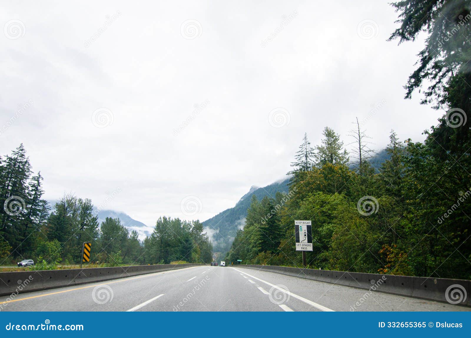 Highway in Hope BC, Canada with Cloud Covered Mountains in the ...