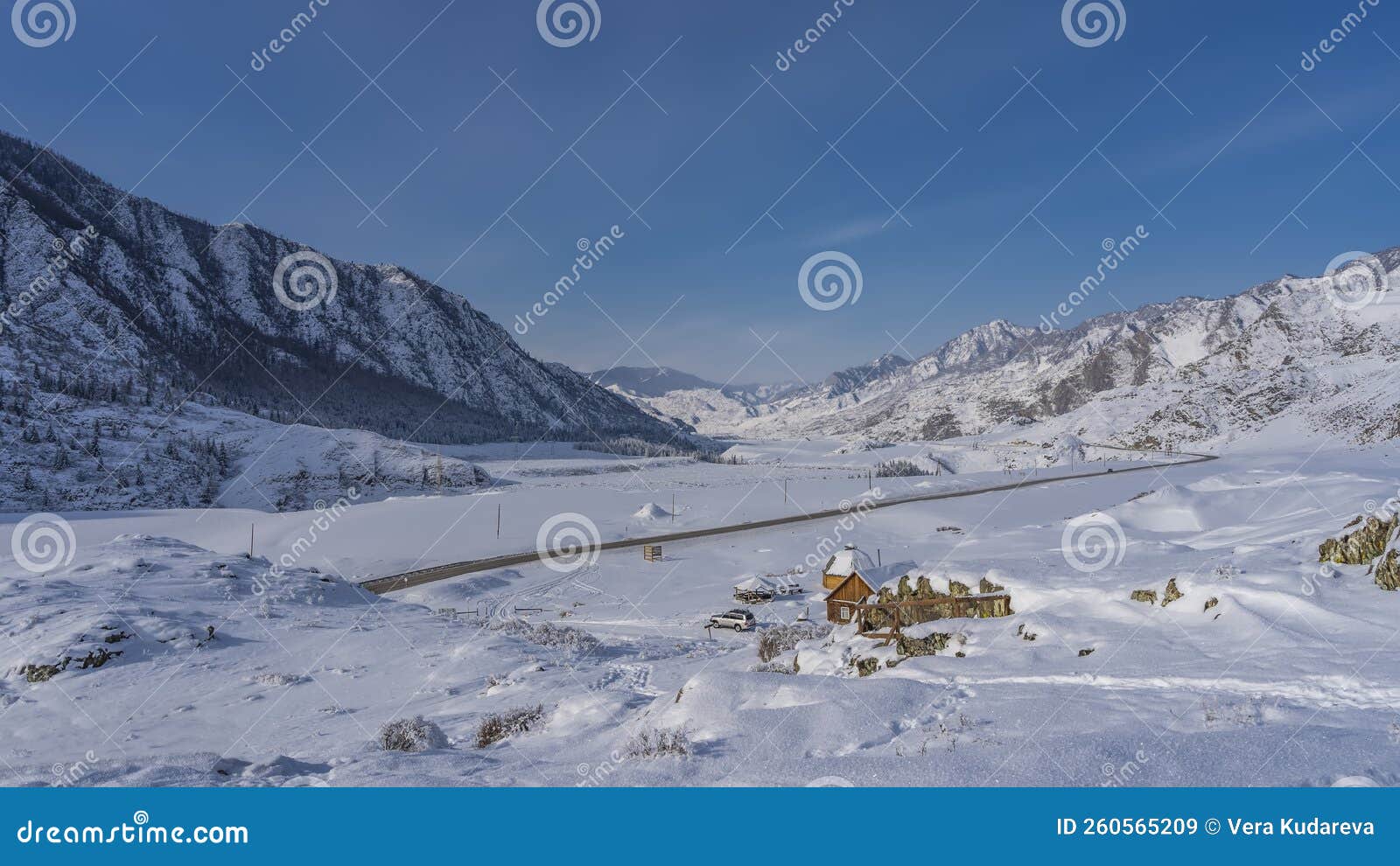 The Highway Passes through a Valley Surrounded by Mountains. Stock ...