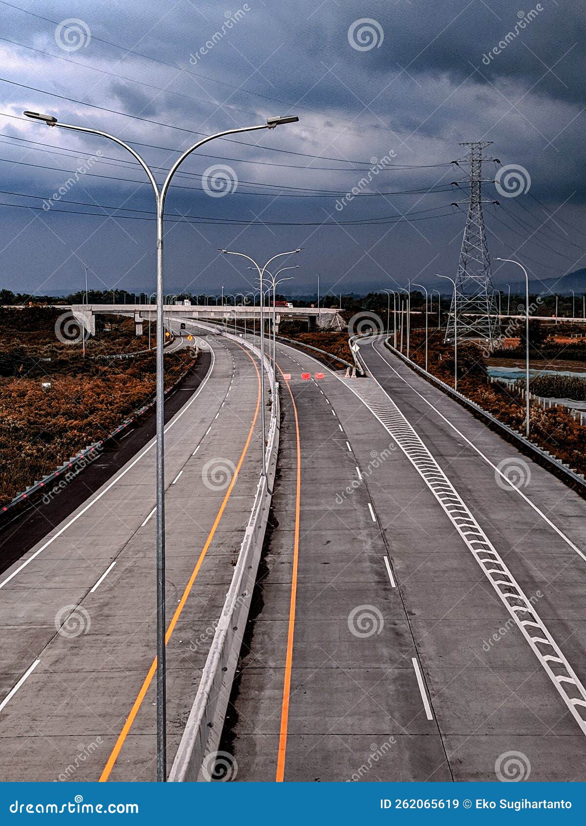 Highway Section with a Dark Sky Stock Image - Image of road, modern ...