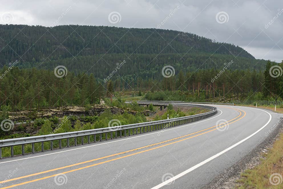 Highway with a Sharp Bend in Norway that Leads into a Mountain Tunnel ...