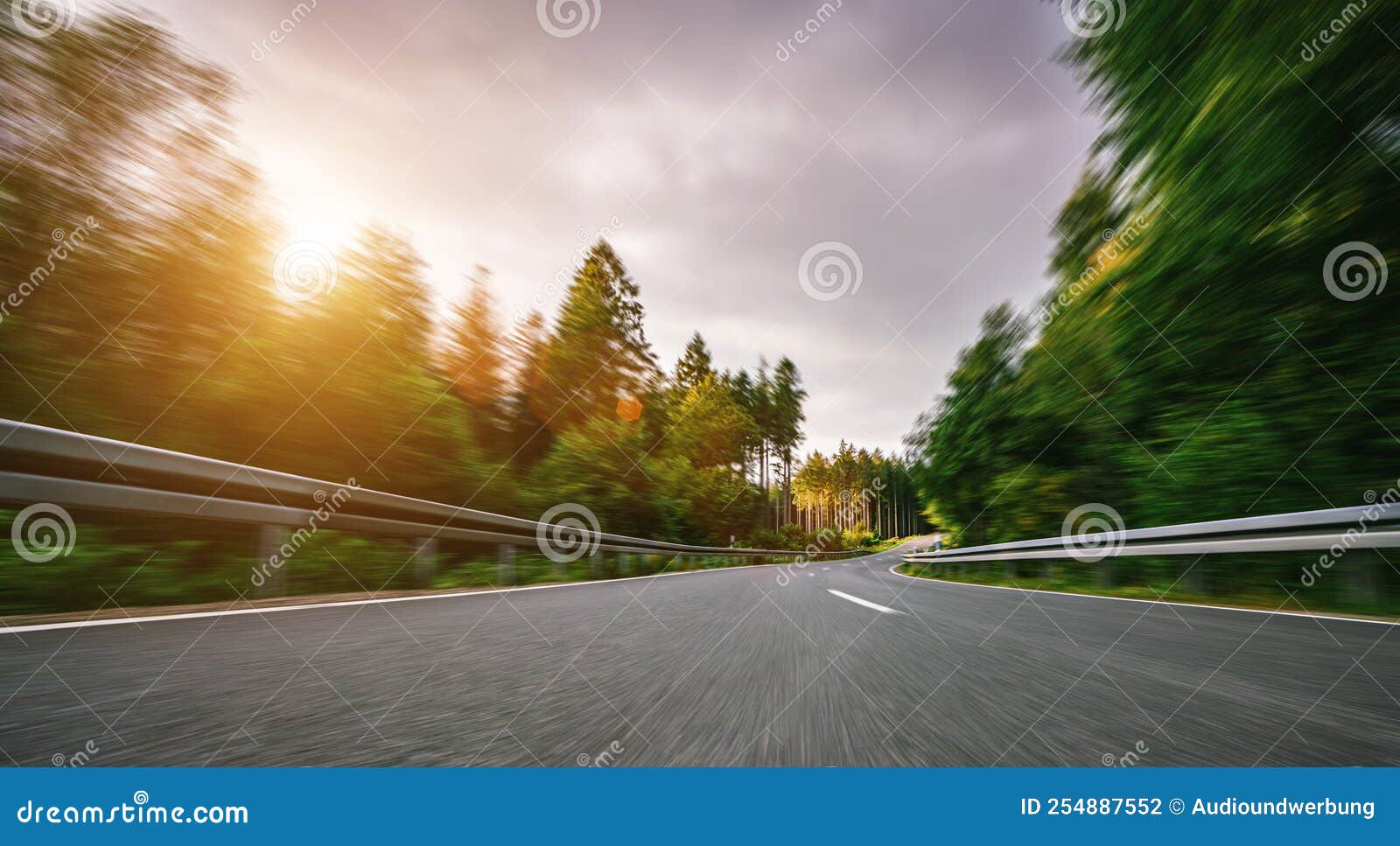 Highway into Silent Forest in Spring with Beautiful Bright Sun Rays ...