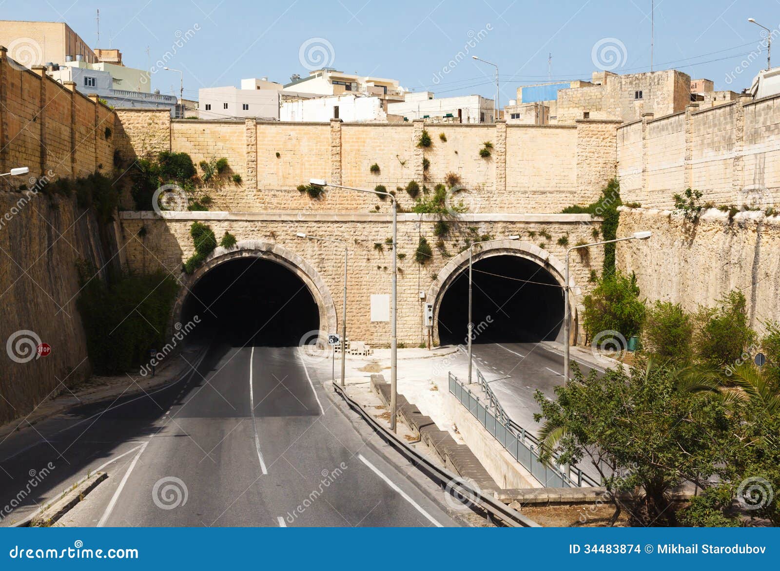 Highway and Steep Walls Around the Tunnel in Malta Stock Photo - Image of rock, highway: 34483874
