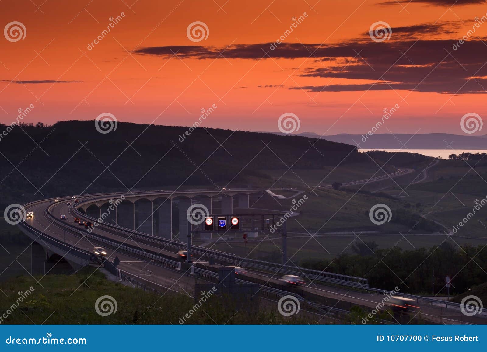 Highway at sunset stock photo. Image of viaduct, automobile - 10707700