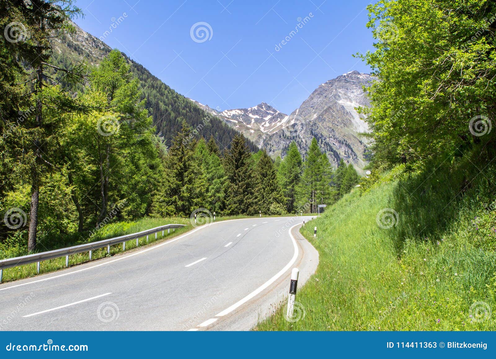 Highway surrounded Alps stock image. Image of line, outdoors - 114411363
