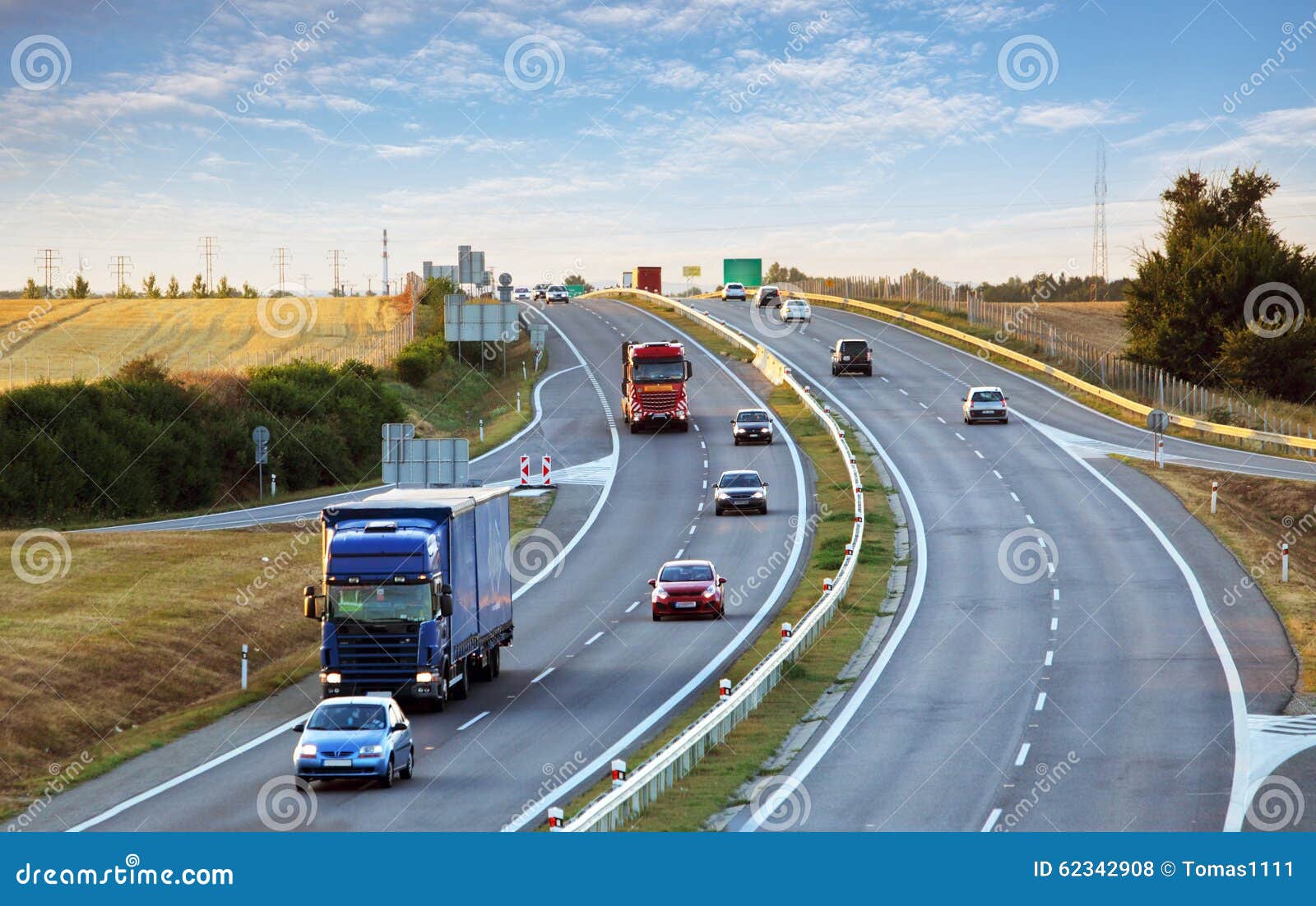 Highway Traffic in Sunset with Cars and Trucks Stock Photo - Image of ...