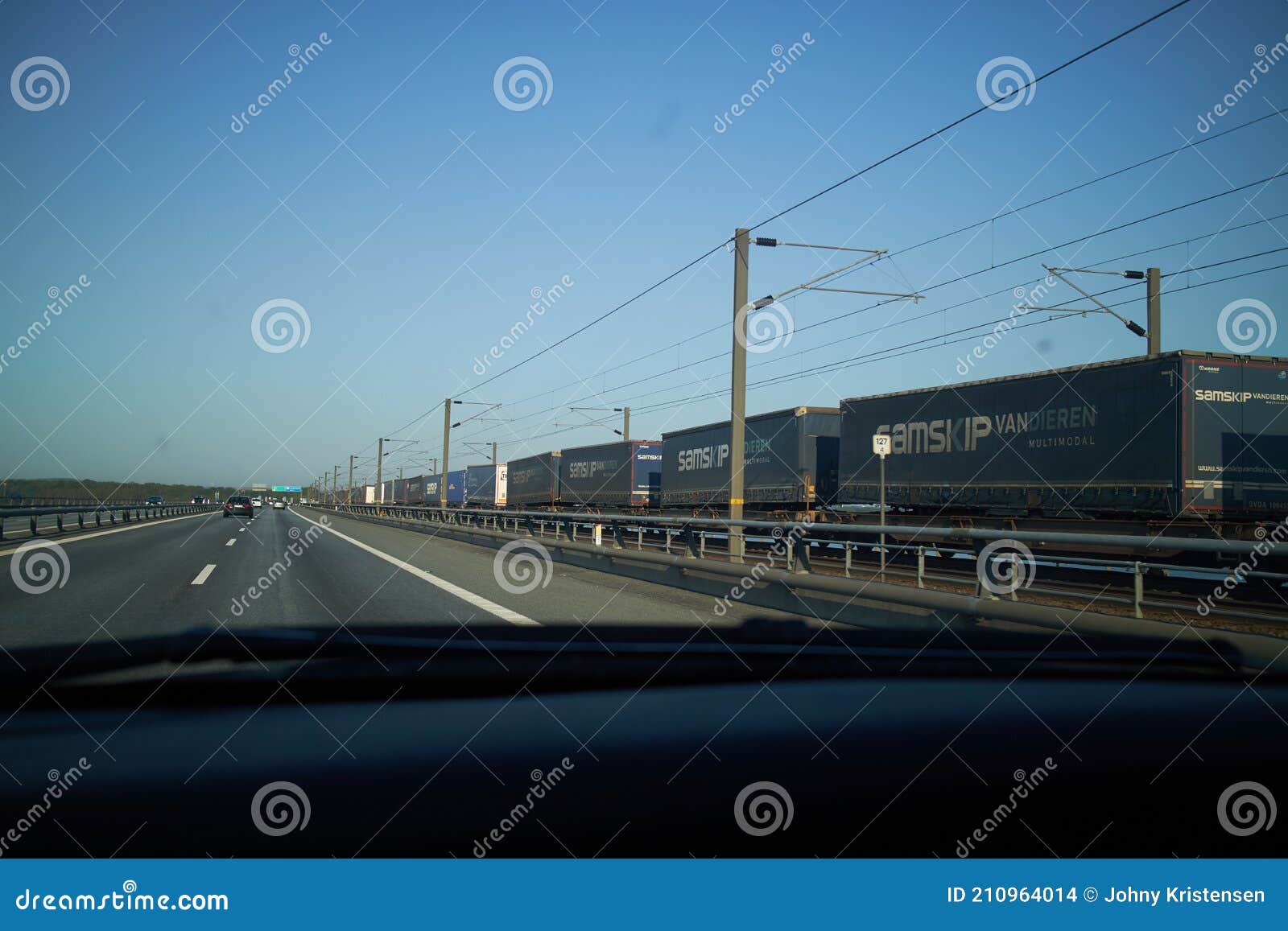 Highway and Train Tracks with Long Train Stock Photo - Image of supply ...