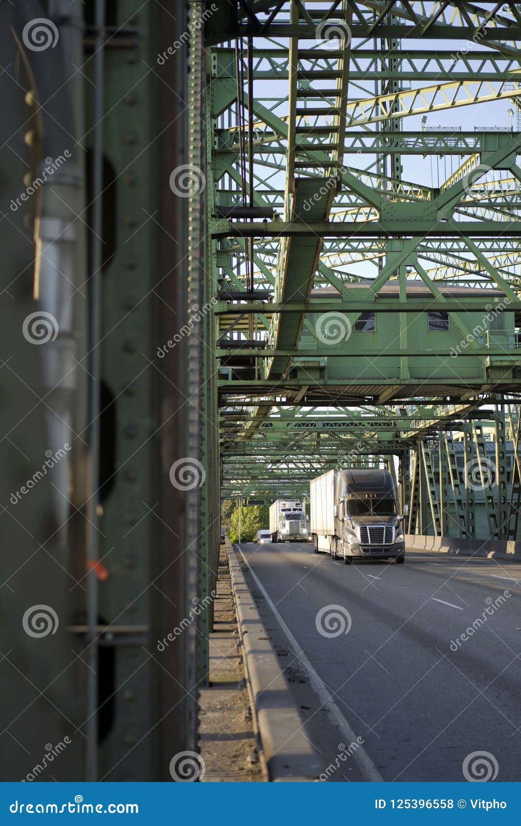 Big Rigs Semi Truck Convoy Transporting Commercial Cargo on Columbia ...