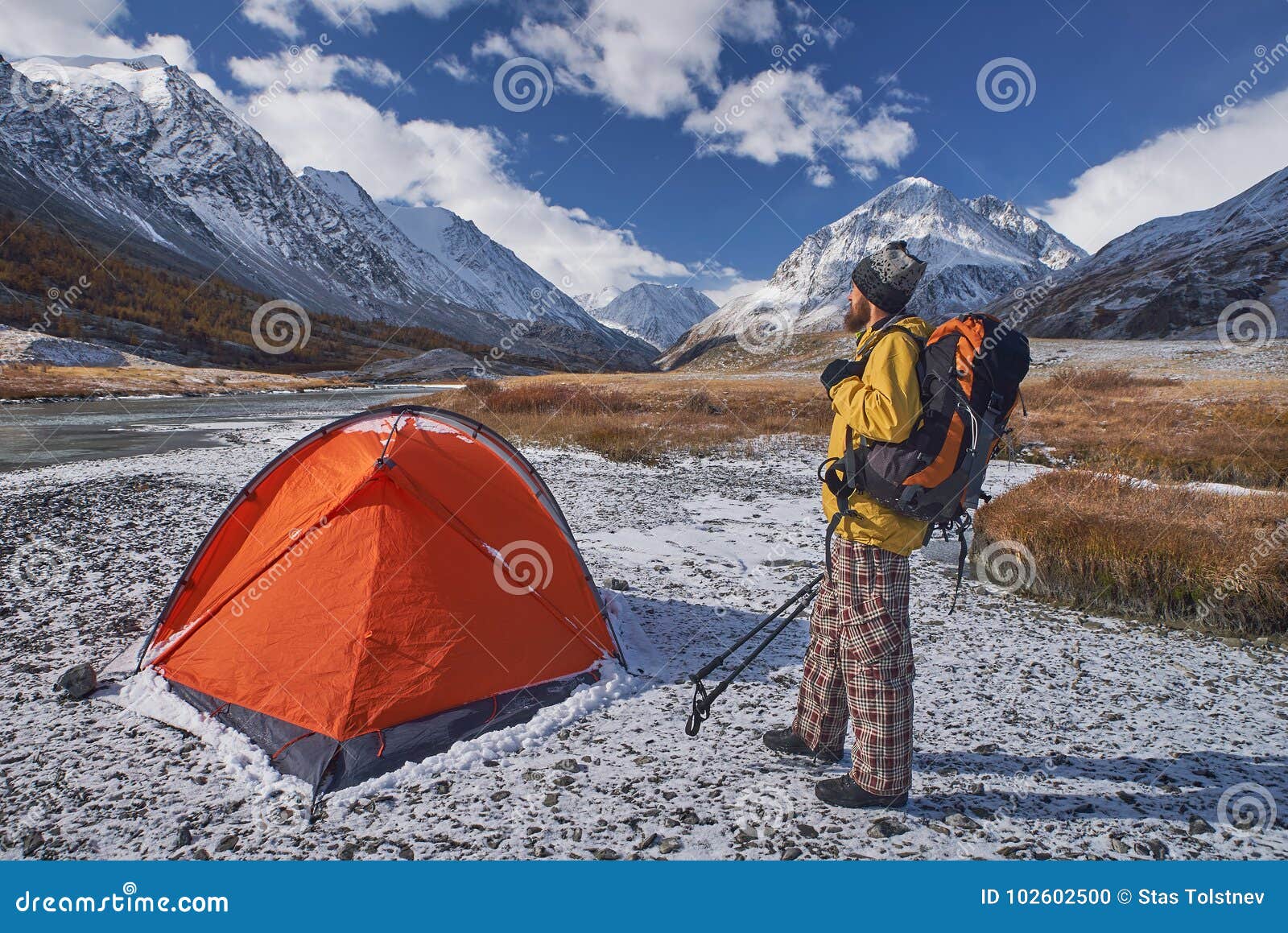 Hiker with Backpack at Camping in the Mountains during Springtime ...