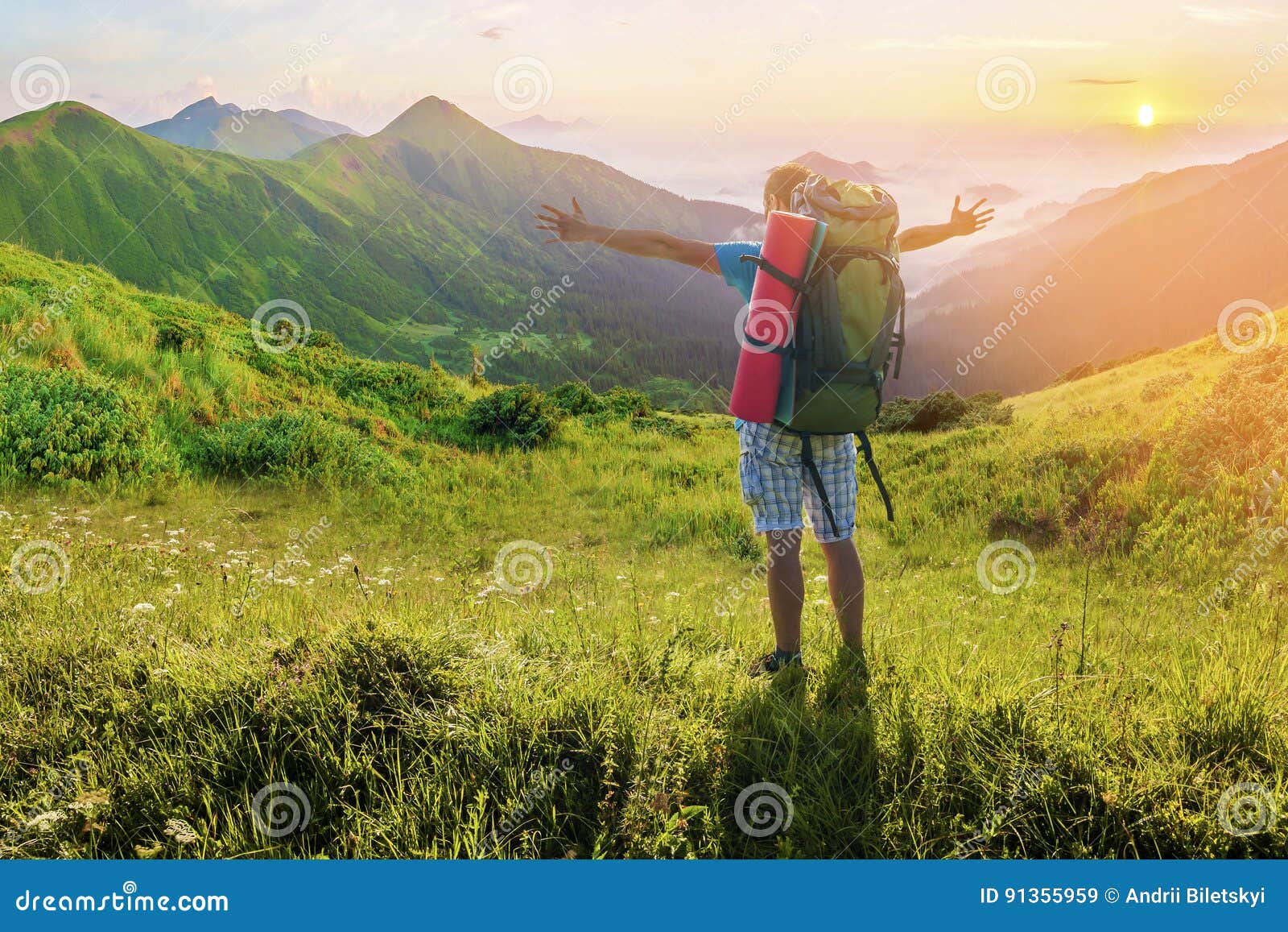 Hiker with a Backpack Standing in Mountains. Amazing Nature Land Stock ...