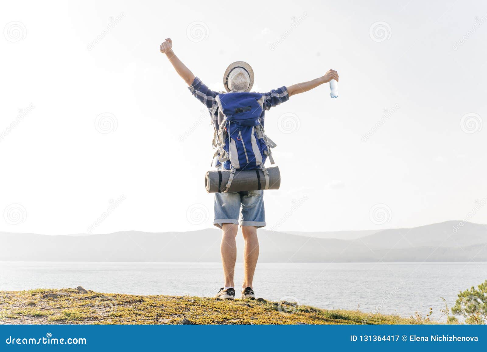 Hiker with Backpack is on Top of a Mountain Stock Image - Image of ...