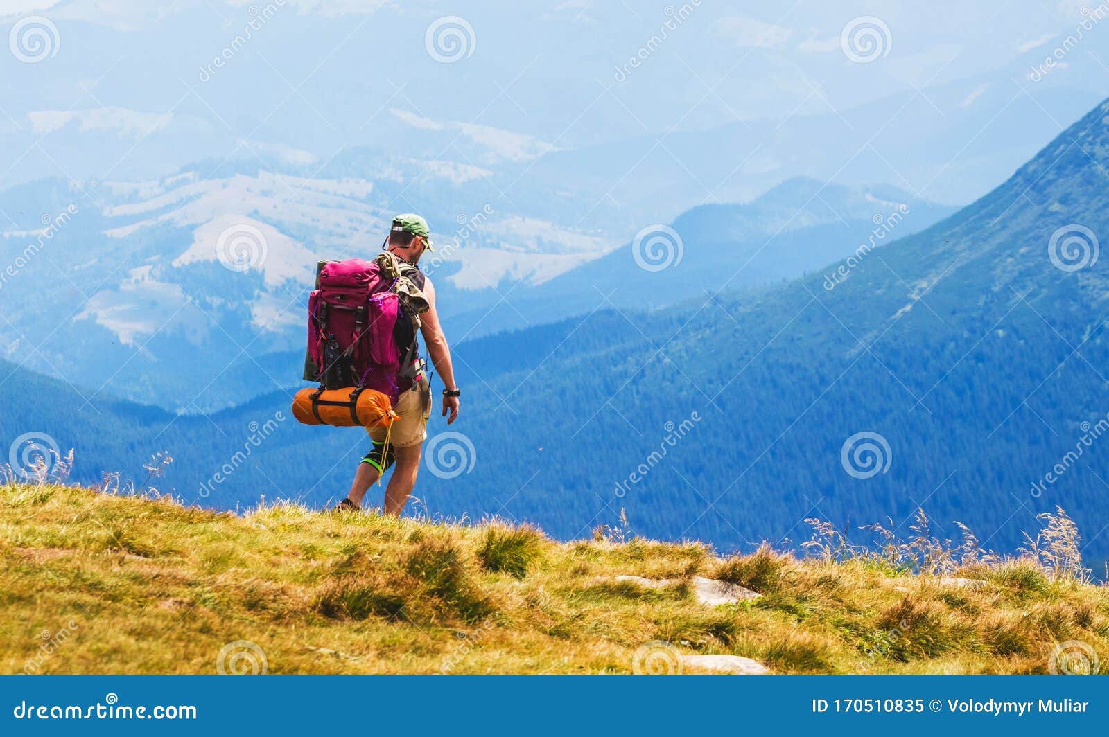 Hiker with Big Backpack on Blue Mountains Background_ Editorial Image ...